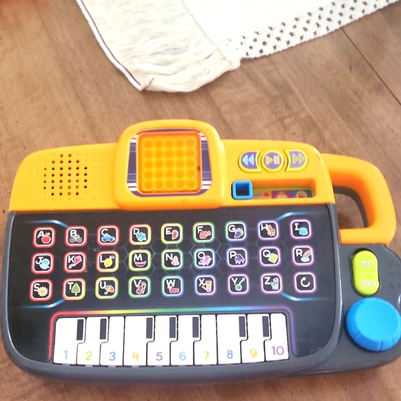 vtech | Toys | Yellow And Black Learning Piano With Interactive ...